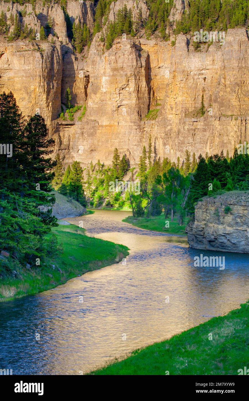 A vertical shot of a River with rocks on the horizon Stock Photo - Alamy