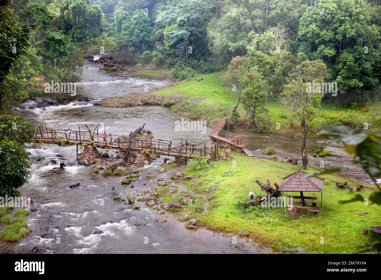 landscape of a river that splits to Tad Fane waterfall Stock Photo - Alamy