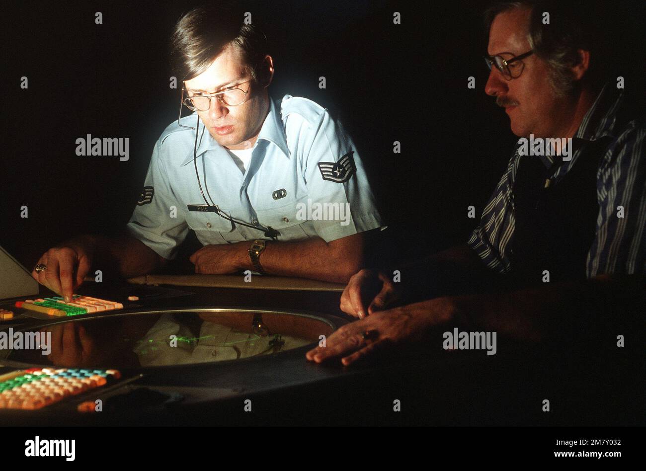 SSGT Michael Pate, an air traffic controller, monitors a radar ...