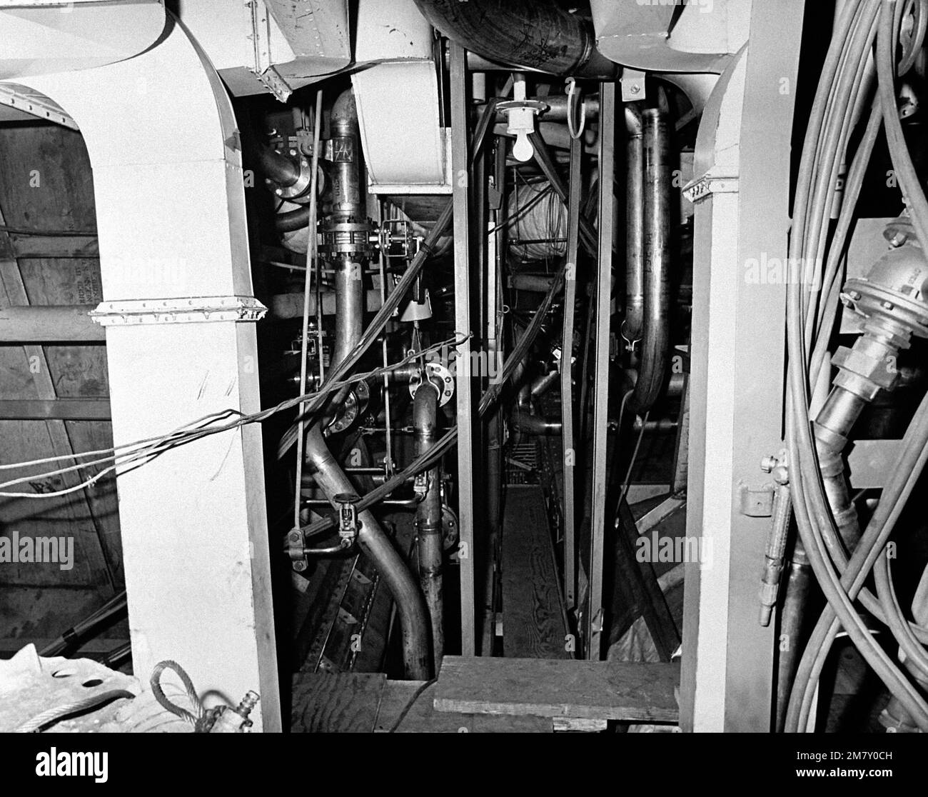 An interior view of the engine room on the guided missile frigate USS ...