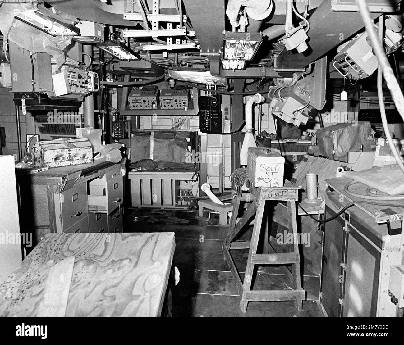 An interior view of the combat information center on the guided missile ...