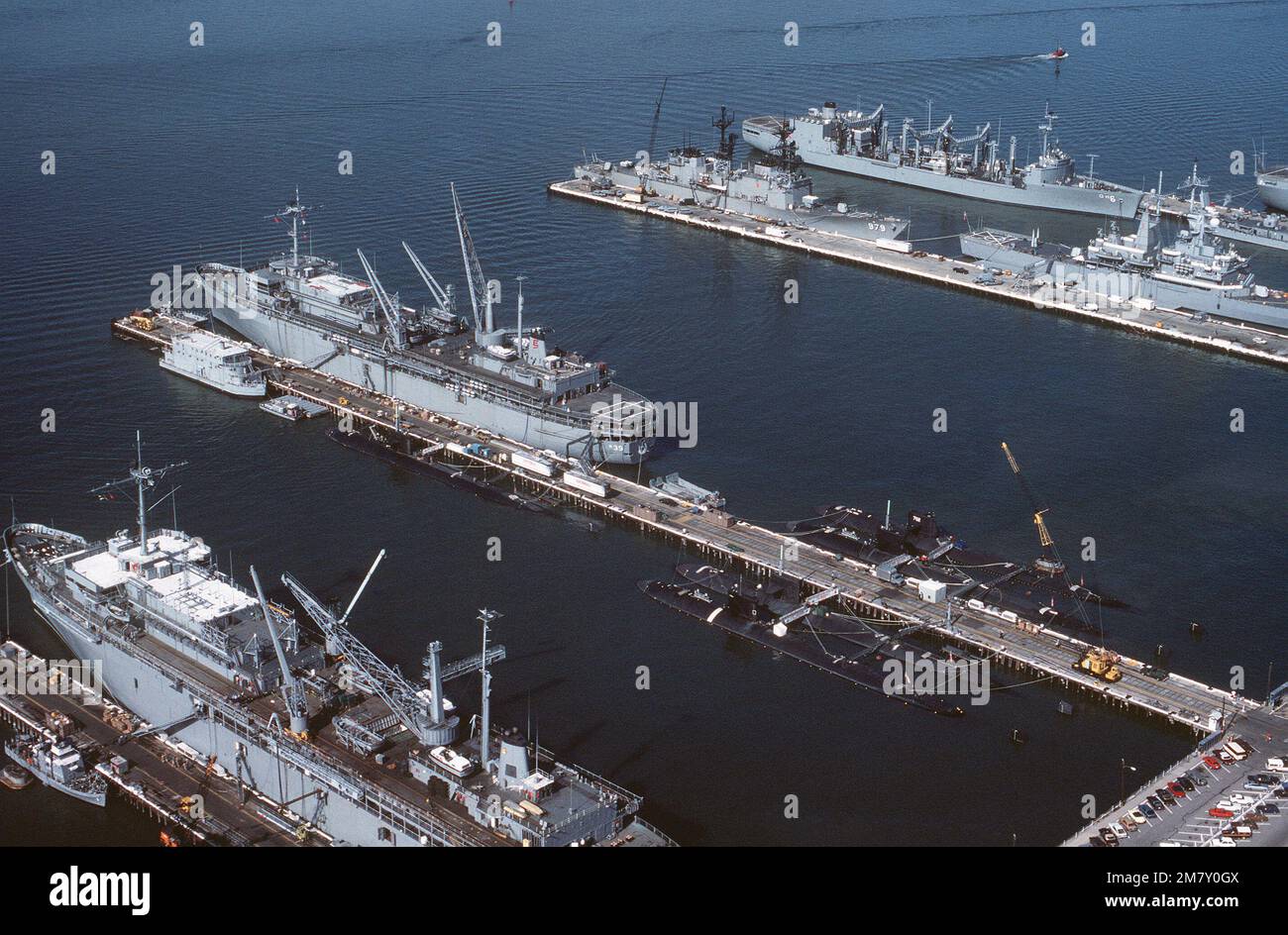 Aerial view of the submarine tenders USS EMORY S. LAND (AS-39) and USS ...