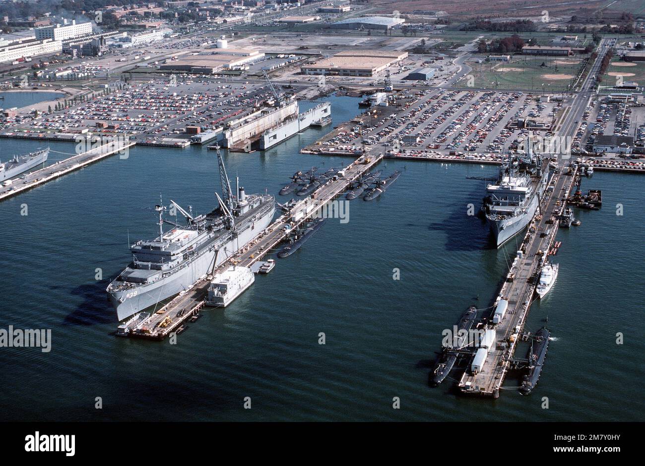 Aerial view of the submarine tenders USS EMORY S. LAND (AS-39) and USS ...