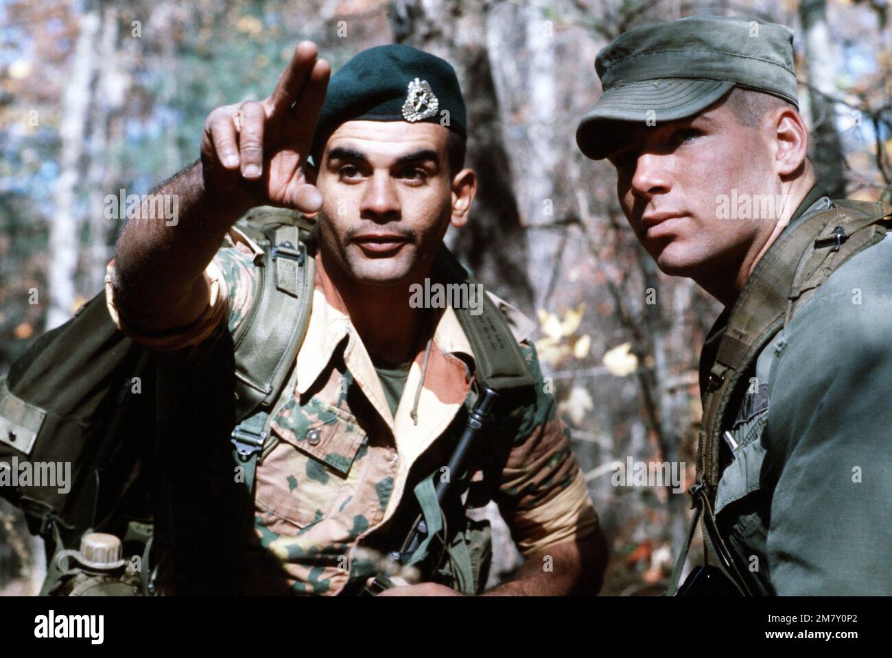 LT Hamad Al-Angari of Kuwait discusses patrol operations with PFC Steve ...