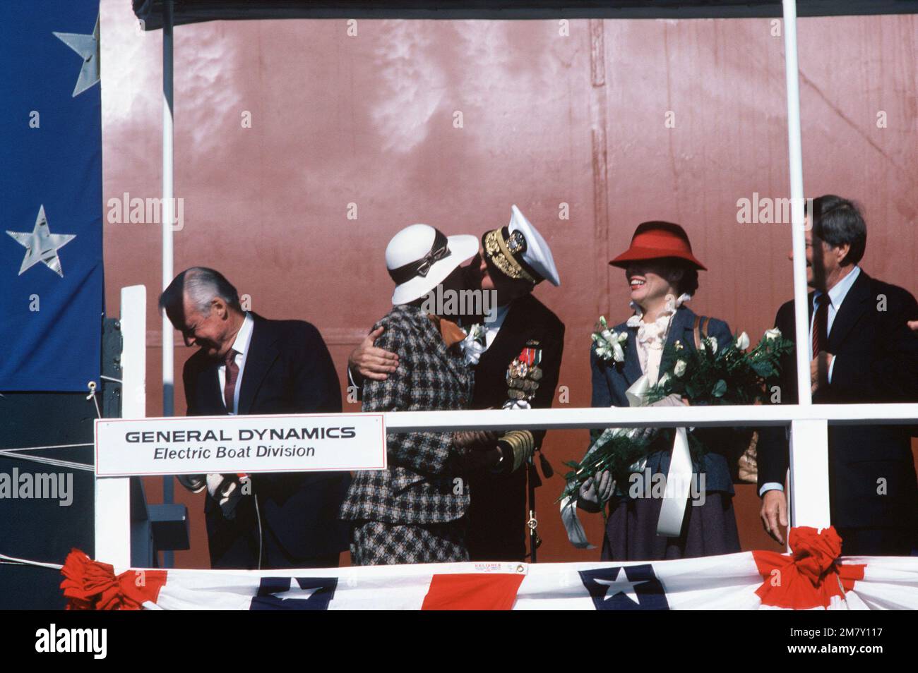 Admiral (ADM) James D. Watkins, Chief of Naval Operations, kisses his ...