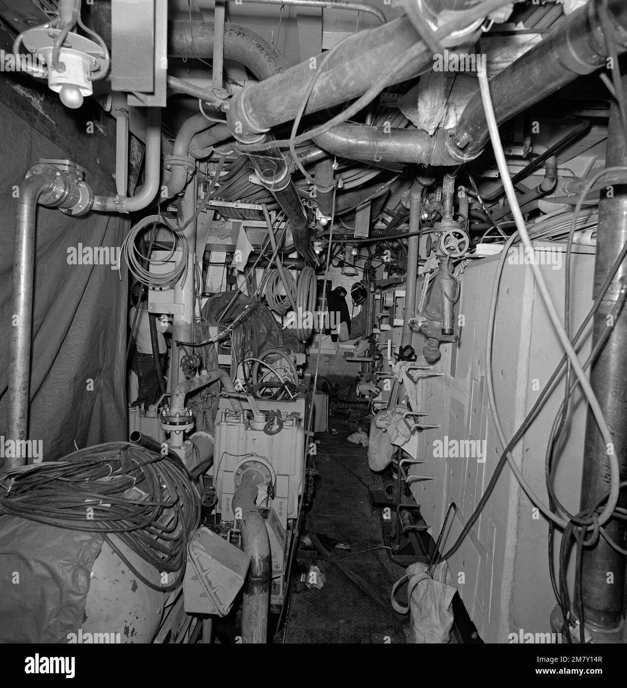 The lower level engine room aboard the guided missile frigate DE WERT ...