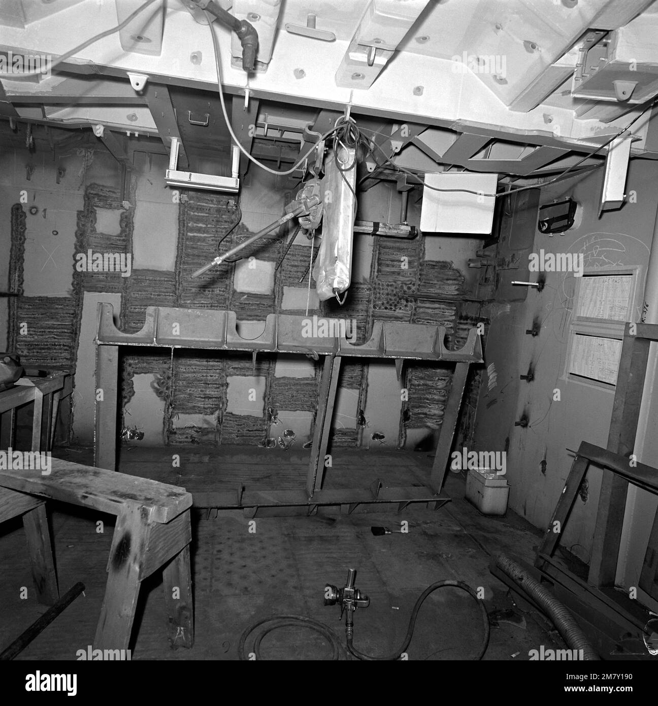 The helicopter haul-down and traverse machinery room aboard the guided ...
