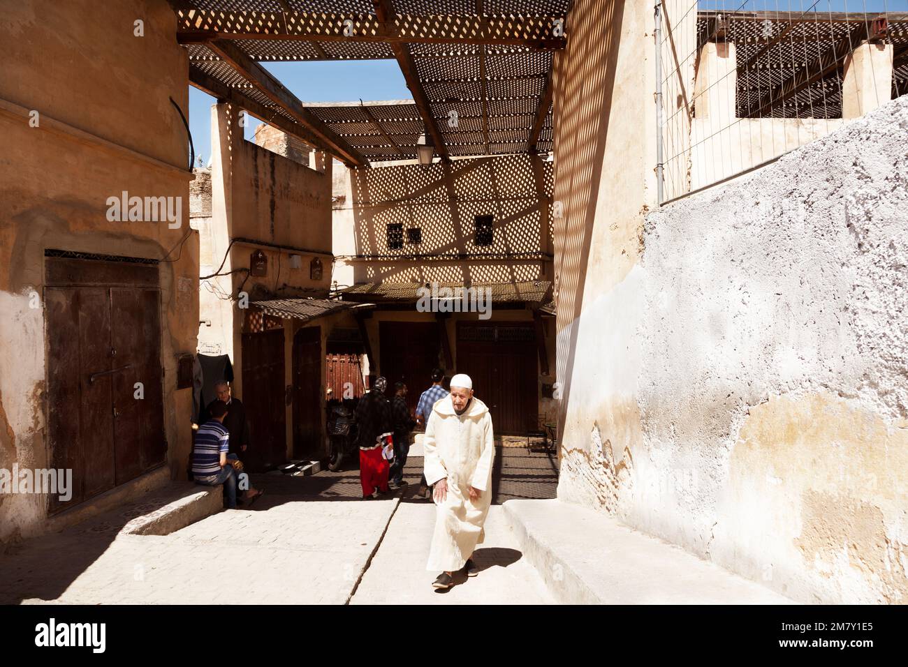 Fez, Morocco-April 25, 2014: Group of people sitting around a table and ...
