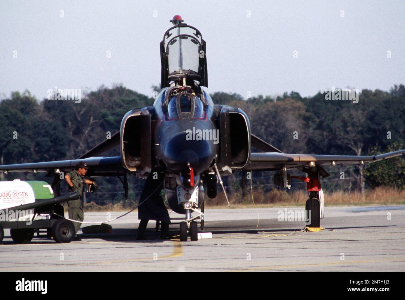 An F-4 Phantom aircraft takes on oxygen during Exercise Quick Thrust ...