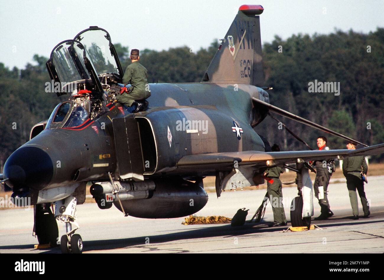 The crew of an F-4 Phantom II aircraft completes a post-flight ...