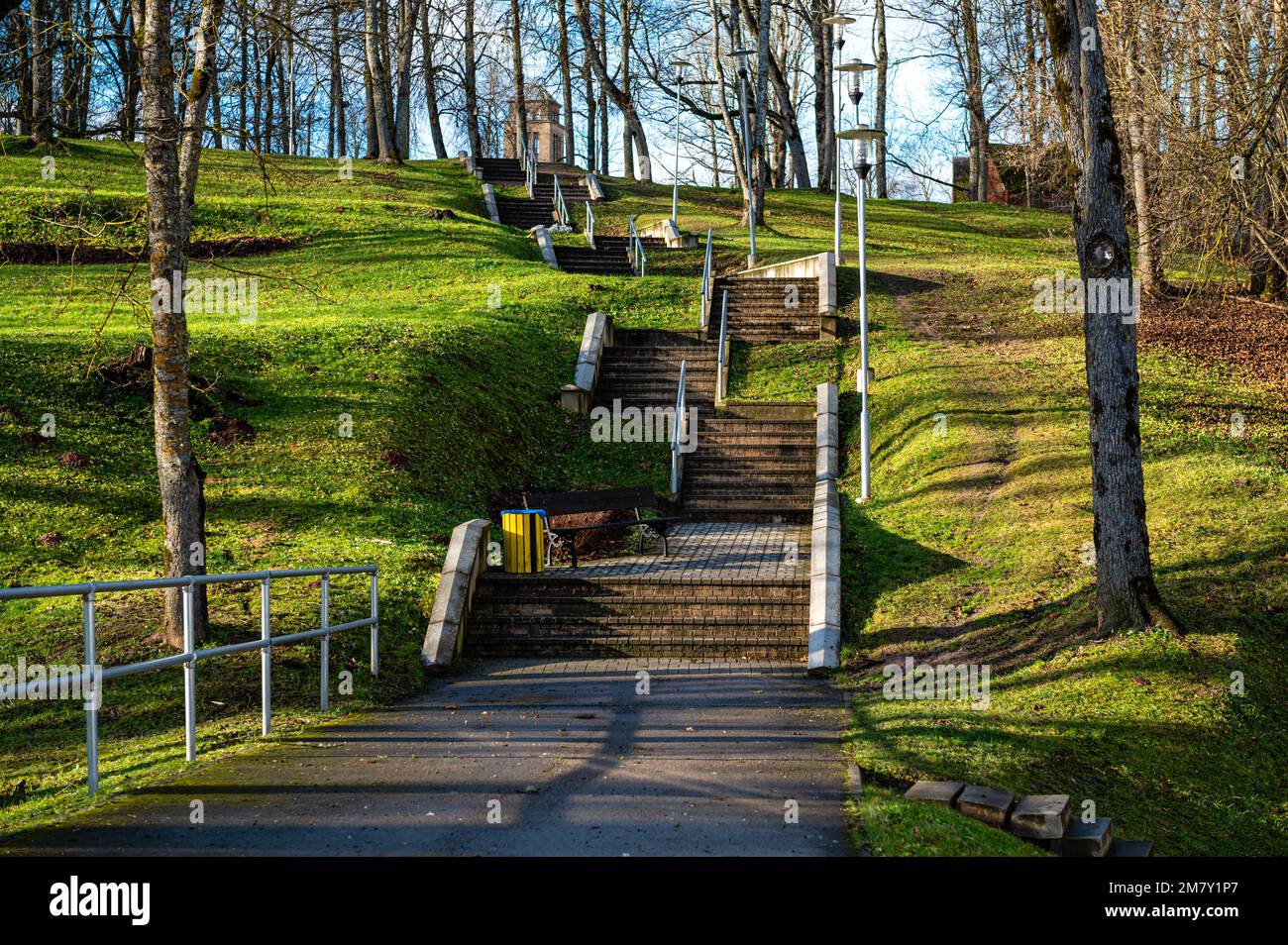 Modern multilevel stone staircase in the park, cement step walkway ...