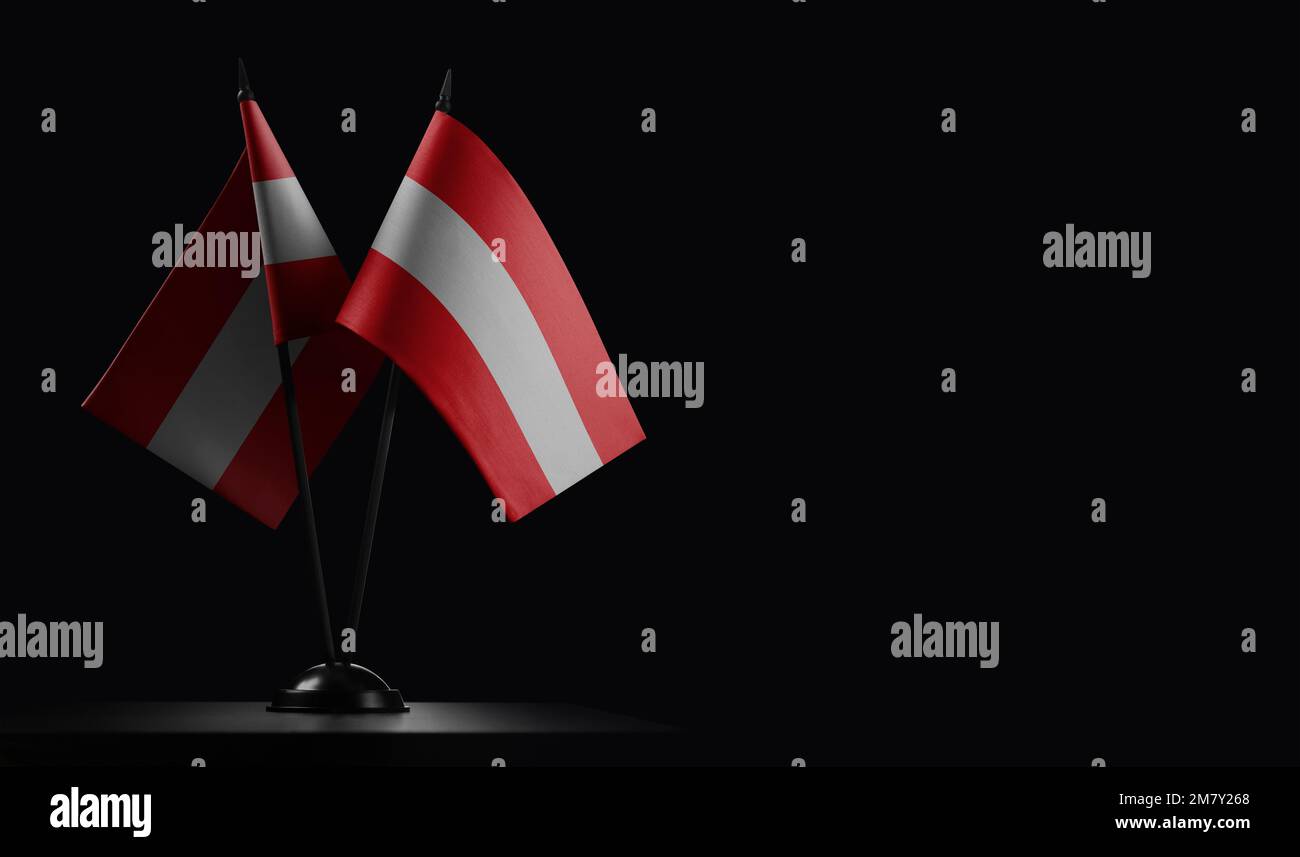 Small national flags of the Austria on a black background Stock Photo ...