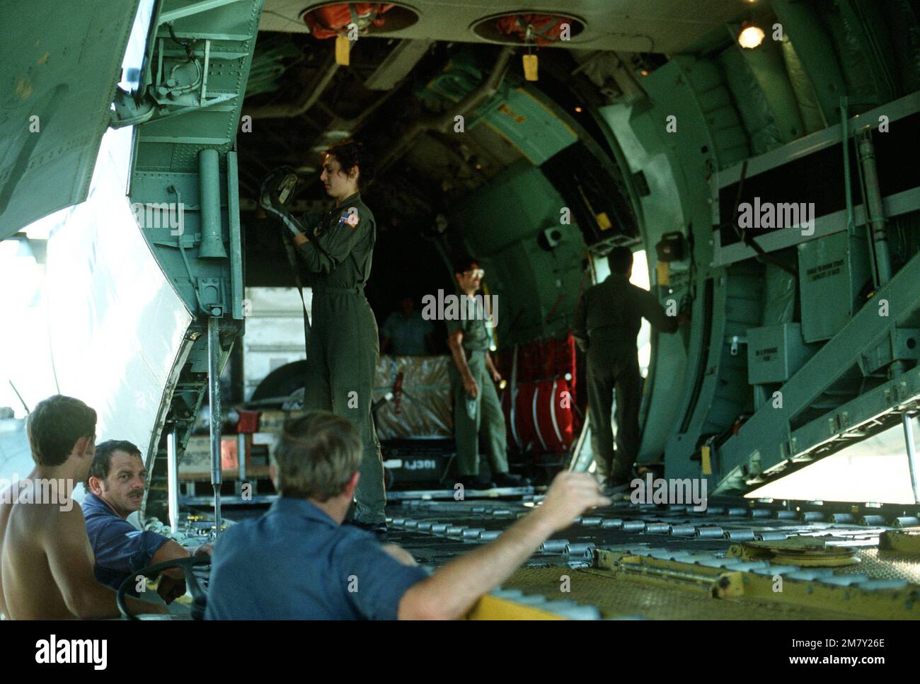 Royal Australian Air Force members stand by as the United States Air ...