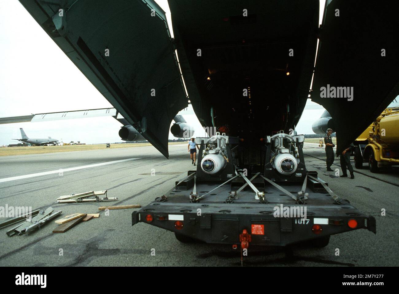 AGM-65B Maverick Scene Magnification missiles are being unloaded from a ...