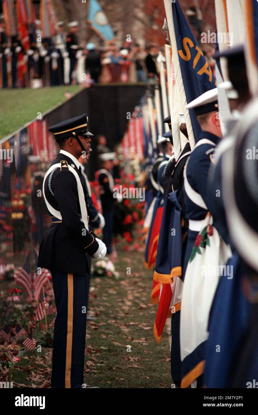 A joint services color guard stands in front of the Vietnam Veterans ...