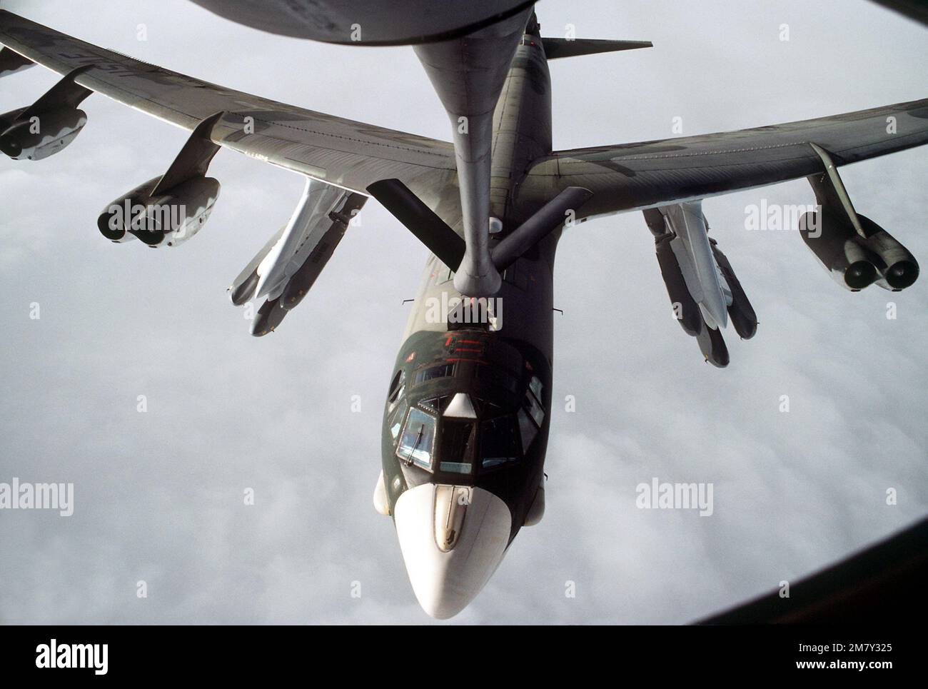 A view of a B-52 Stratofortress aircraft being refueled by a KC-135 Stratotanker aircraft in ...