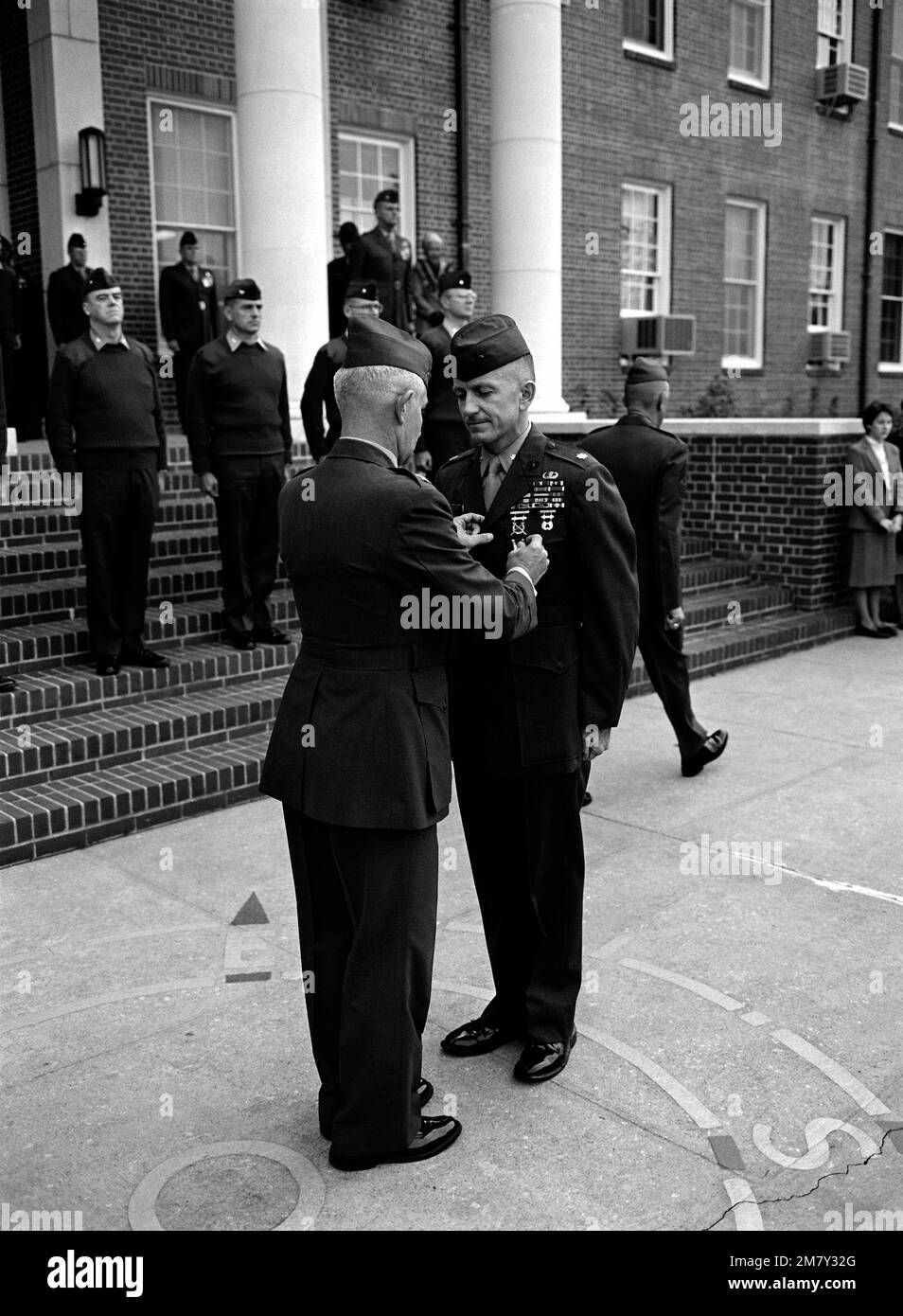 LTC Hopgood receives the Meritorious Service Medal from COL Weatherford ...