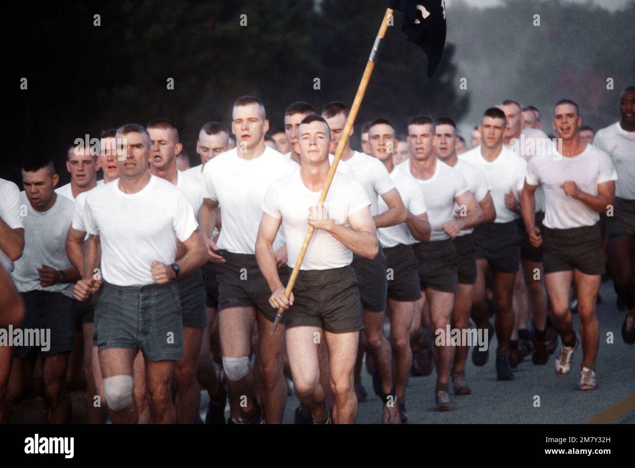 Rangers of the 1ST Battalion, 75th Infantry Division, are jogging ...