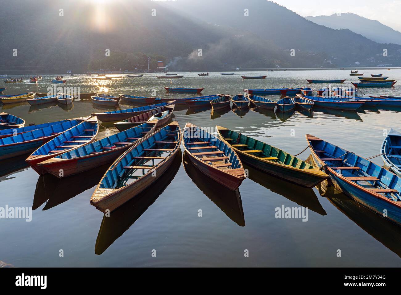 Pokhara, Nepal ; DEcember 4th, 2022; Multi coloured Boats moored in ...
