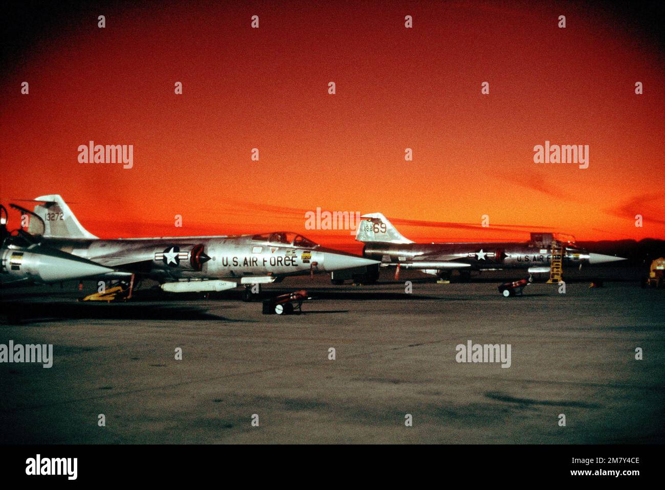 A right side view of F-104G Starfighter aircraft parked on the flight ...
