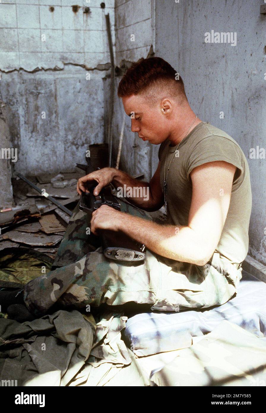 A Marine from the 32nd Marine Amphibious Unit (32nd MAU) passes time by ...