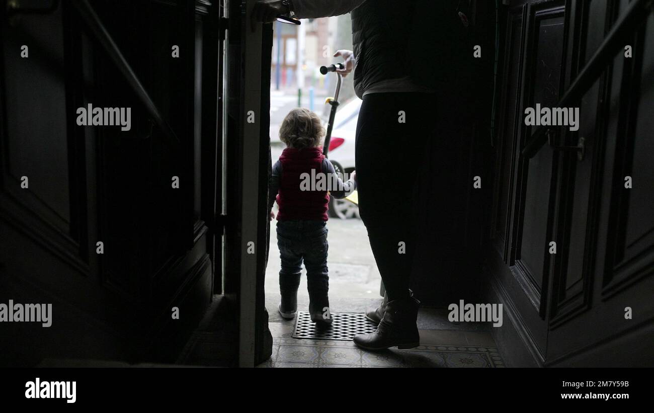 Boy stepping out door hi-res stock photography and images - Alamy