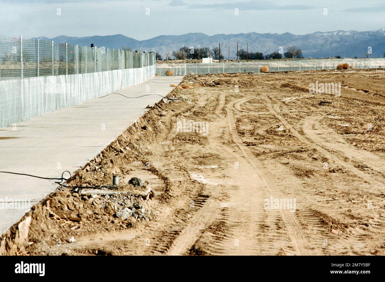 A view of construction underway for an F/A-18 Hornet aircraft hangar ...