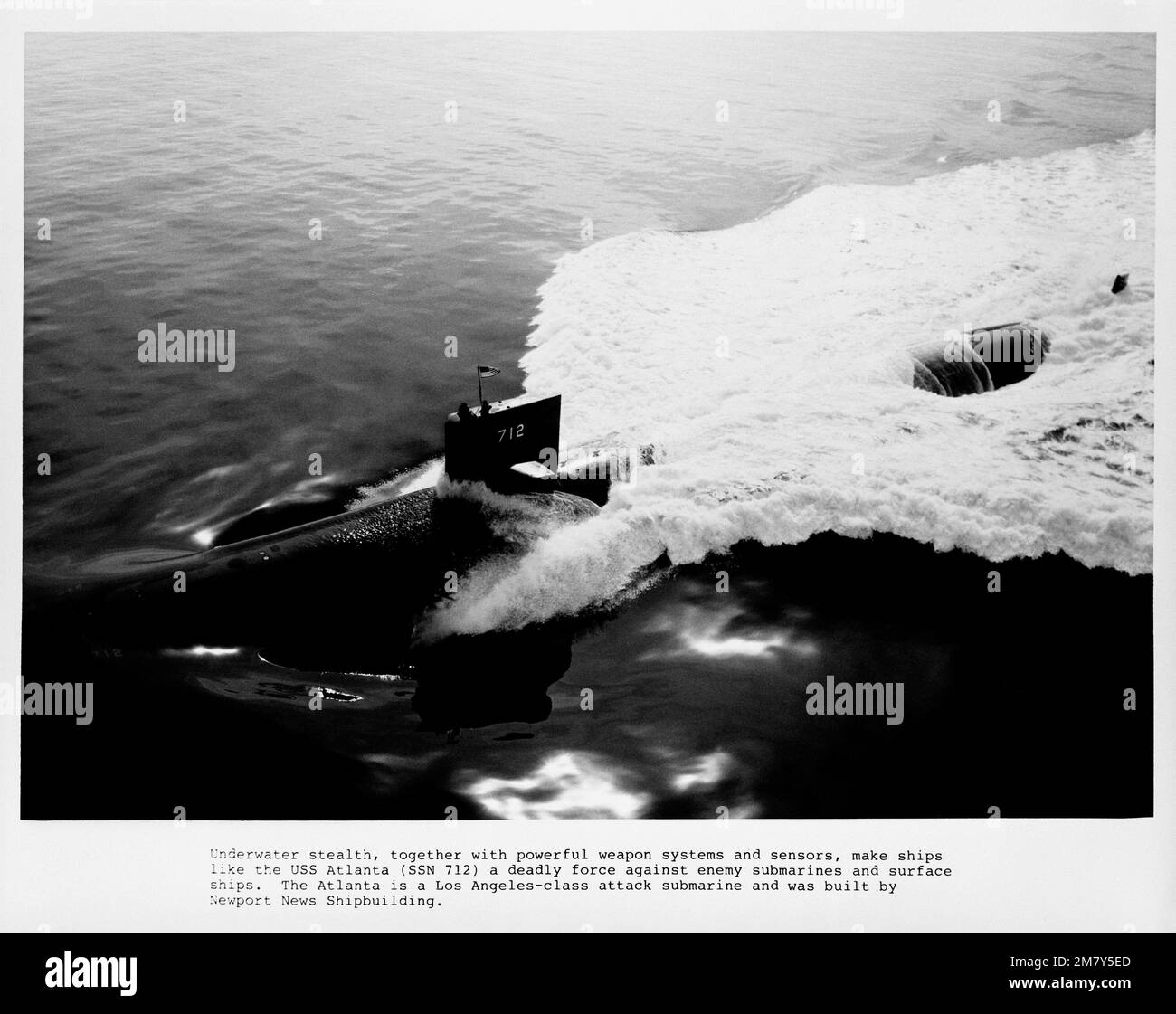 An aerial port bow view of the nuclear-powered attack submarine USS ...