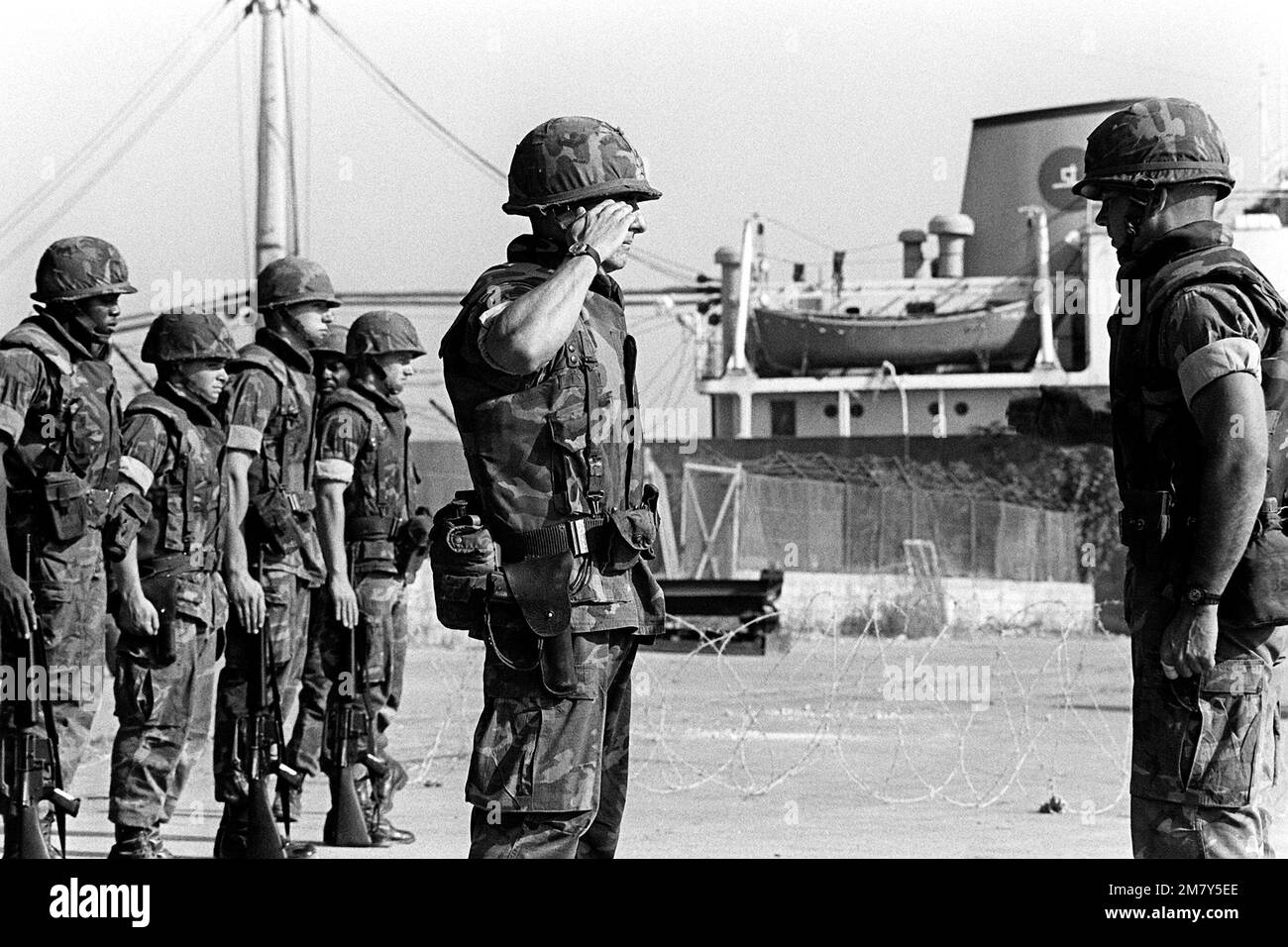 Marines from the 32nd Marine Amphibious Unit stand in formation upon ...