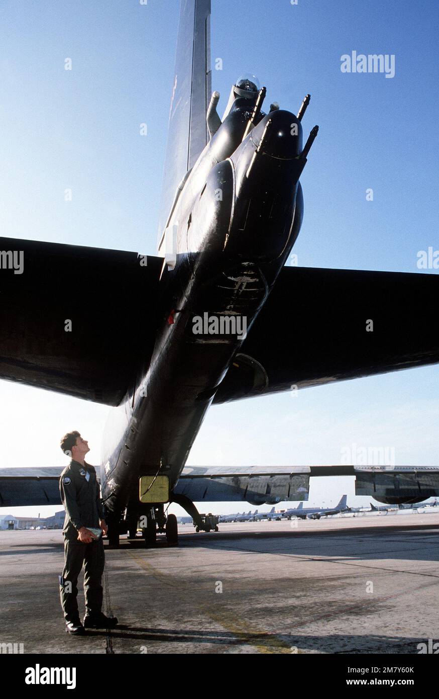A1C Luke Shelton, a tailgunner, examines the tail section of a B-52D ...