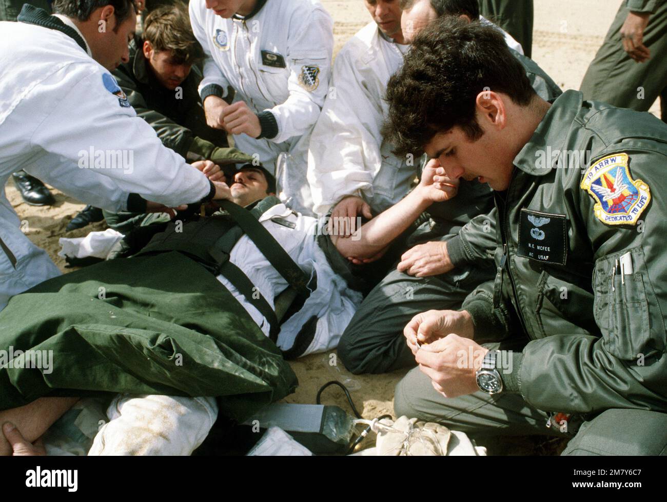 TSGT Tony Biondo is treated for a broken thigh bone after his main ...