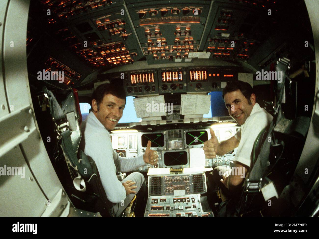 Air Force COL Joe Engle and Navy CAPT Richard Truly give the "thumbs up ...