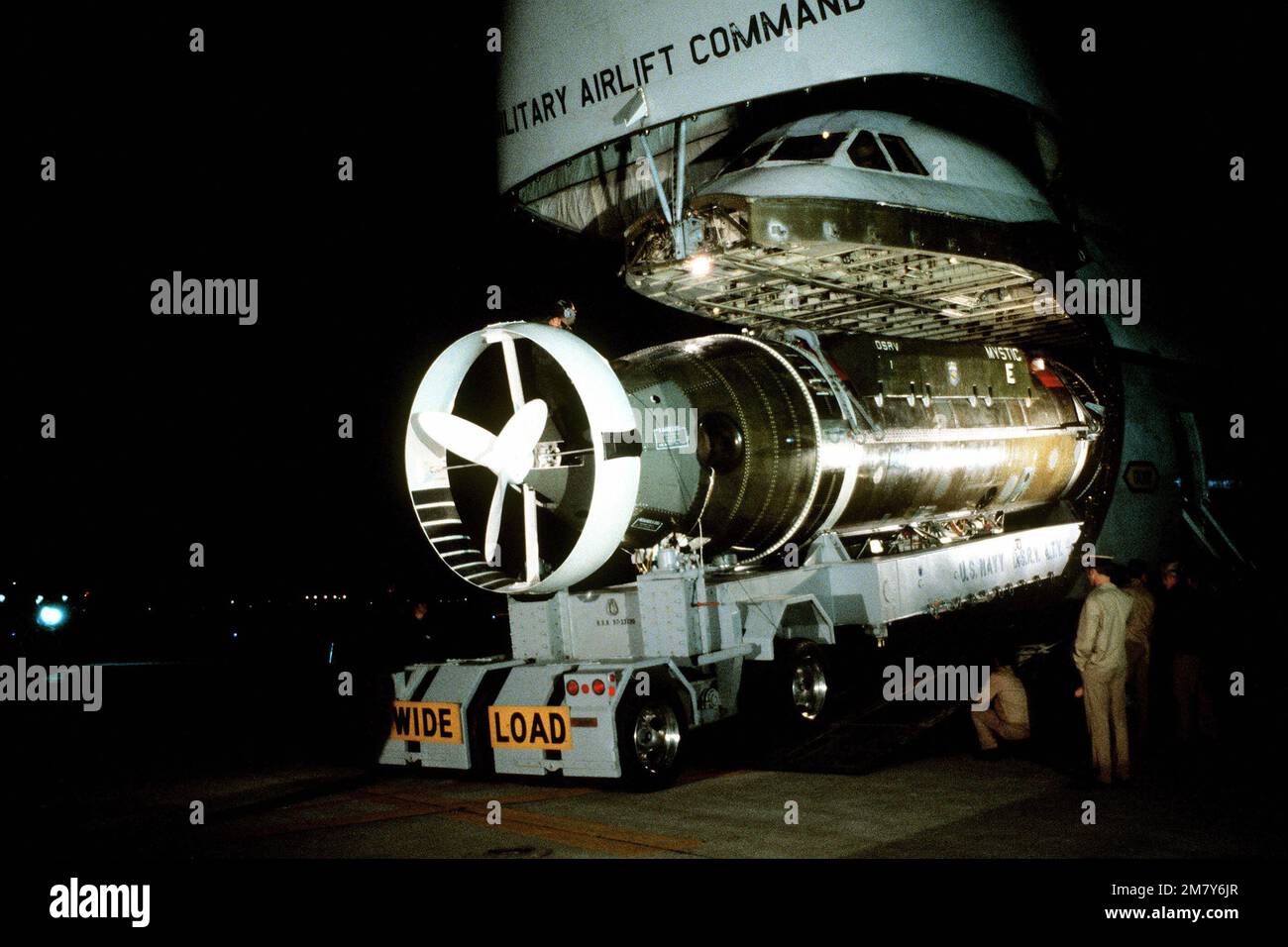 The deep submergence rescue vehicle Mystic (DSRV-1) is being unloaded from a C-5A Galaxy ...