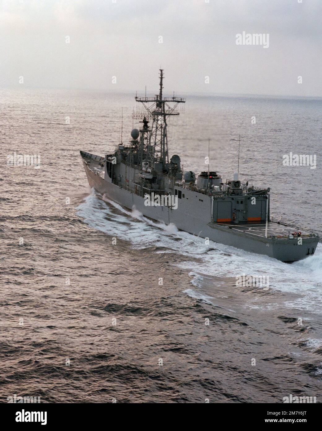 Aerial port quarter view of the guided missile frigate USS RIED (FFG 30 ...