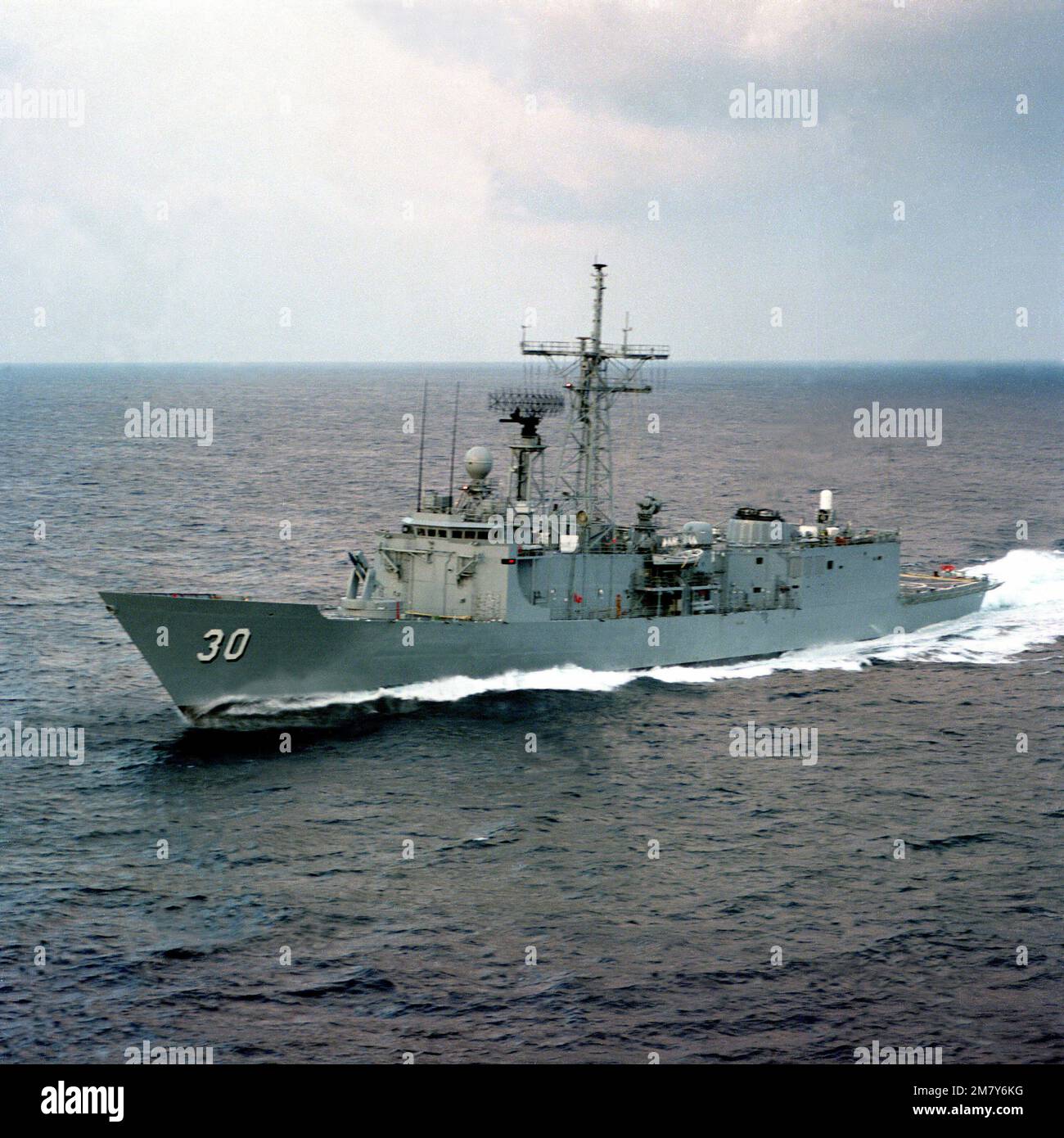 An aerial port bow view of the guided missile frigate USS REID (FFG-30 ...