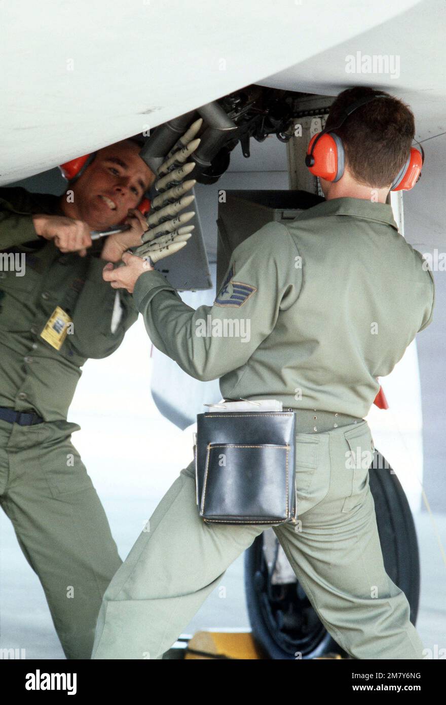 AMN Andrew Jennings and SSGT Felton load 20mm shells into an F-15 Eagle ...