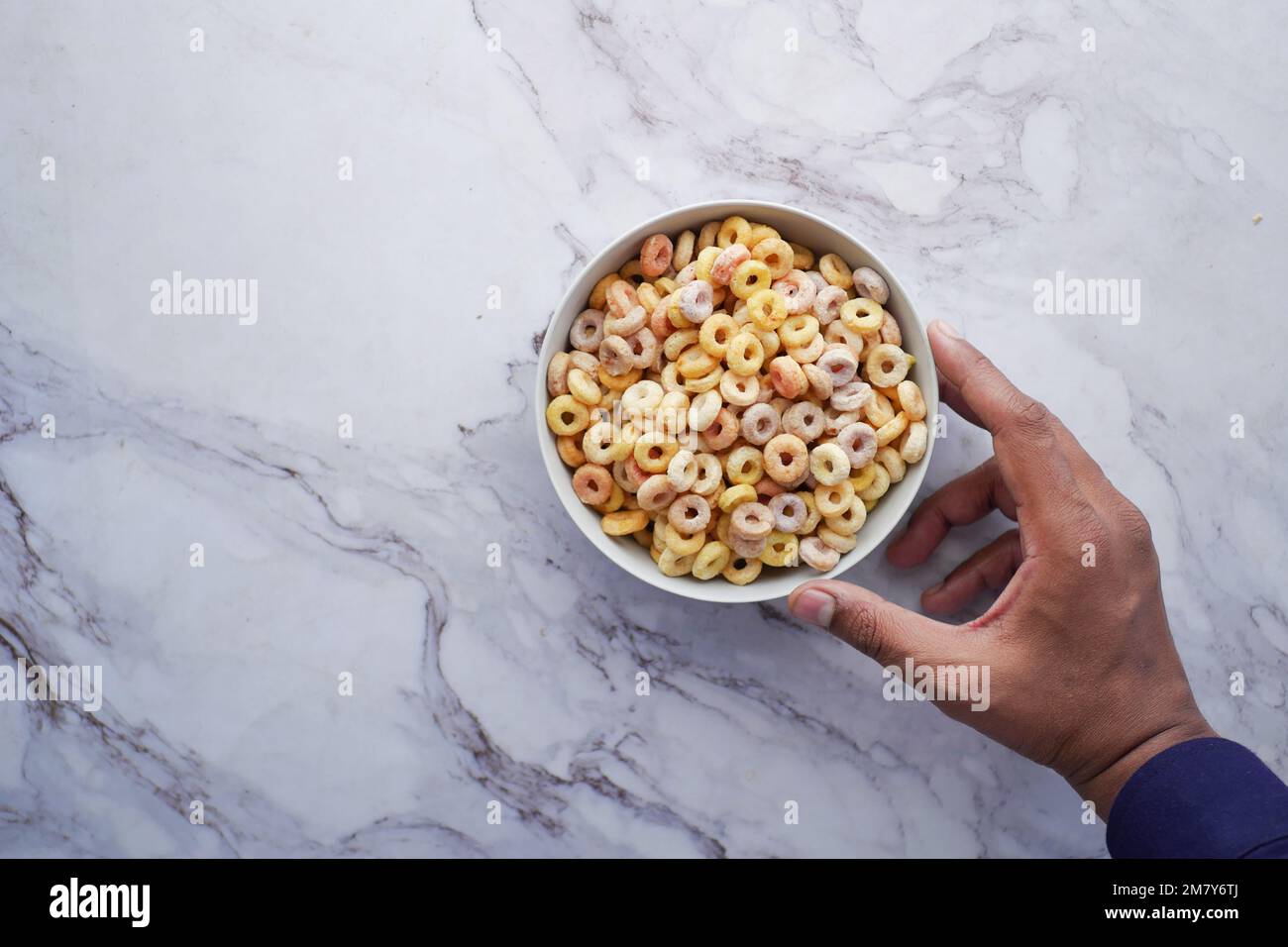 top view of colorful cereal corn flakes in a bowl Stock Photo - Alamy