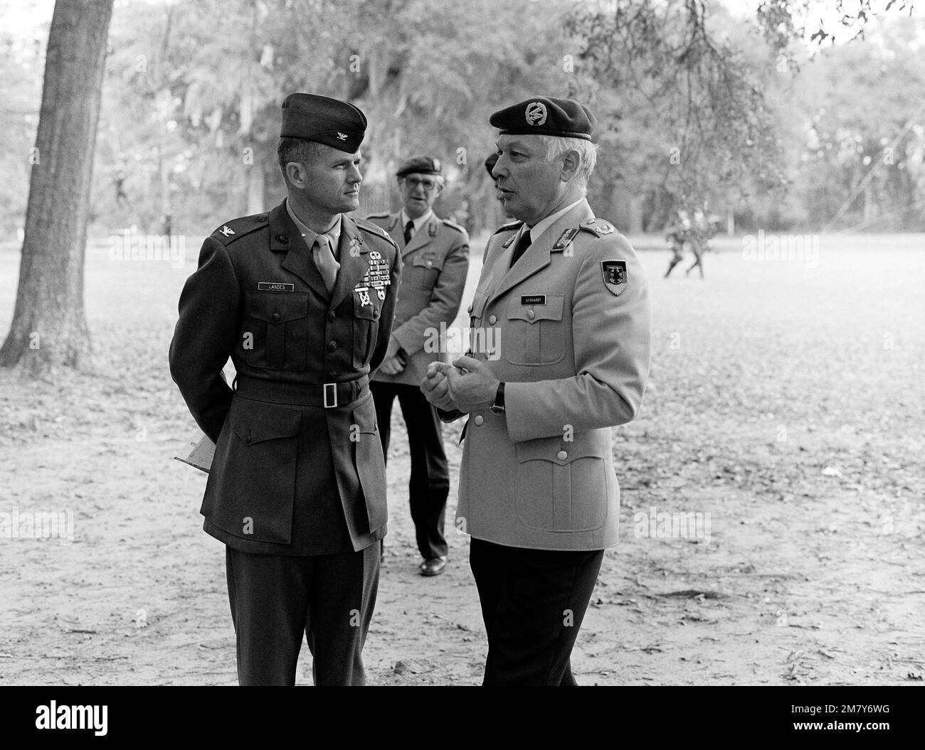 COL Burrell H. Landes Jr. (left) listens to a question from GEN ...