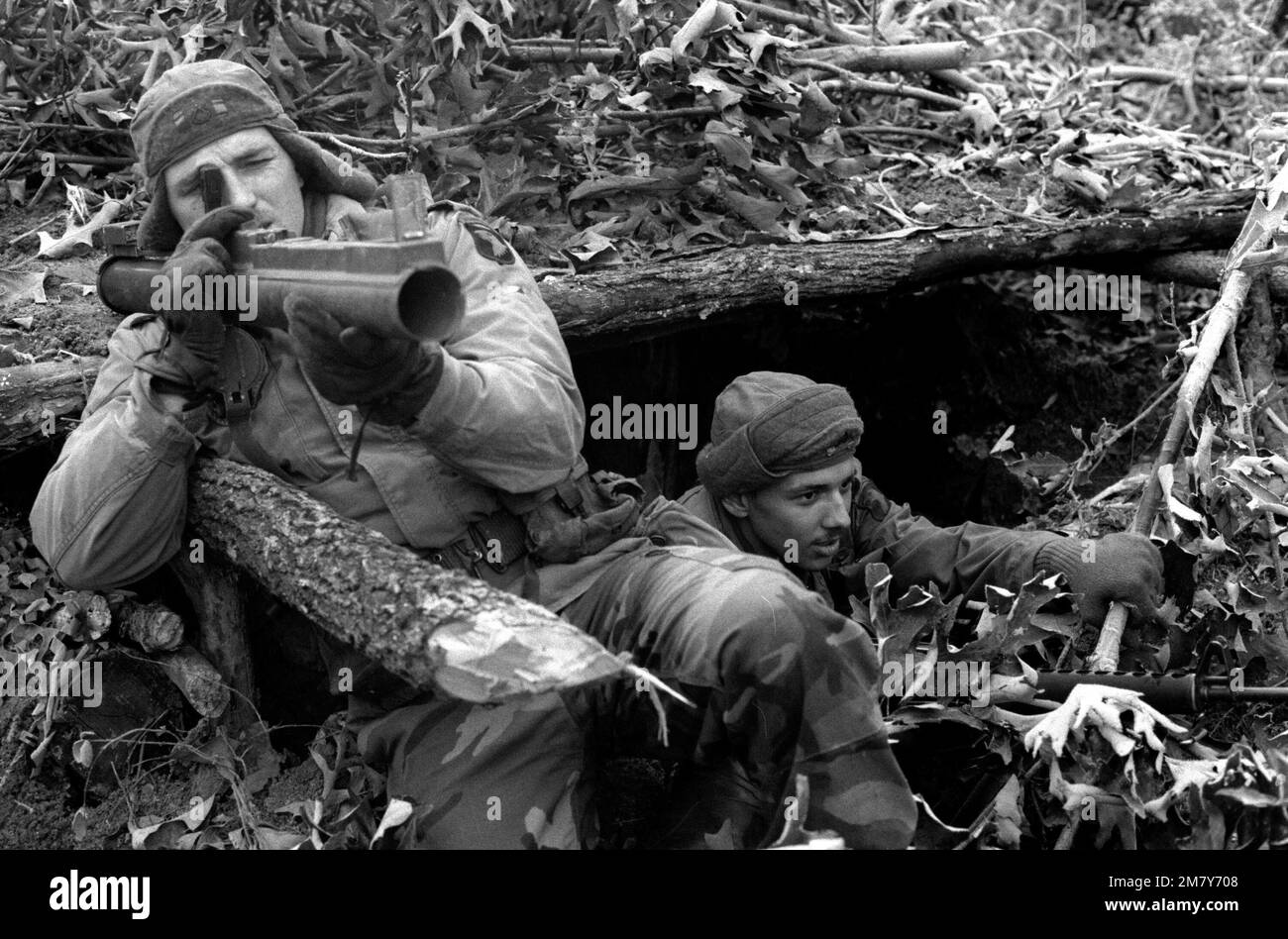 PFC Gary Heath and SGT Michael Robillard of the 1ST Bn., 321st Field ...