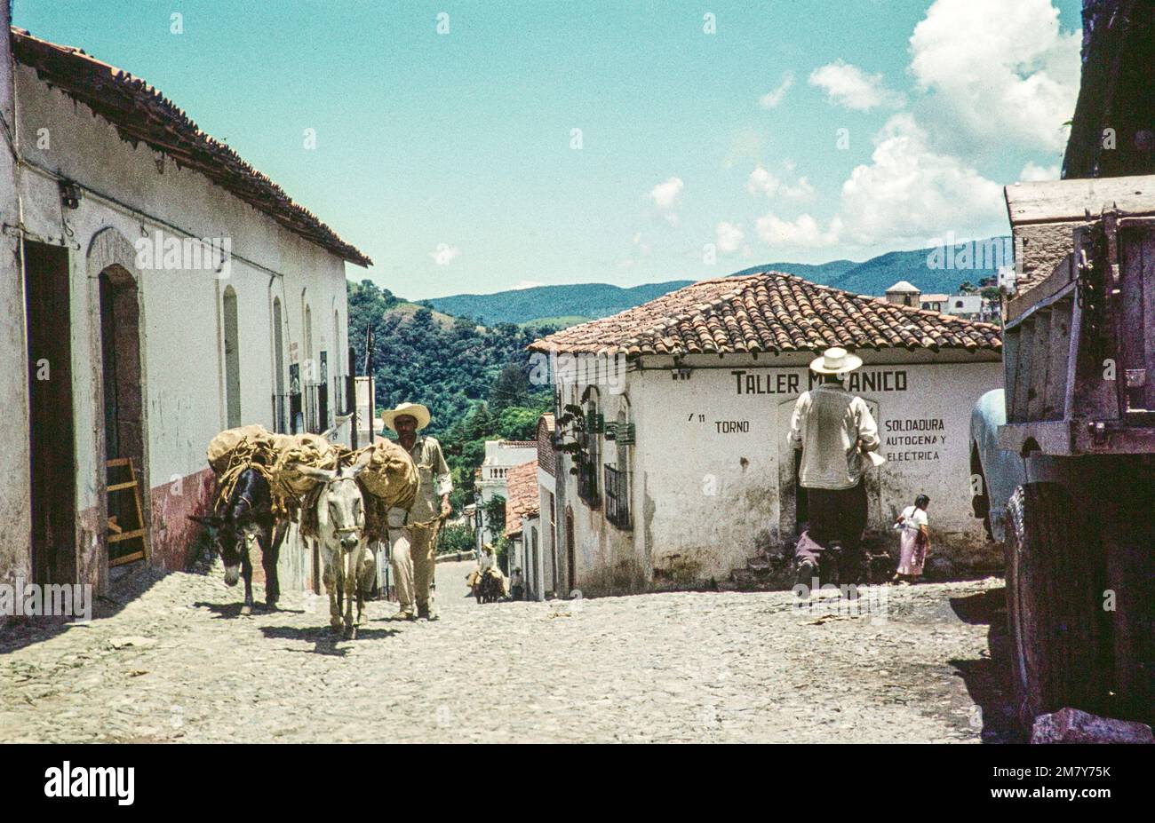 Town street with donkeys, Taxco, state of Guerrero, Mexico, 1961 Stock ...