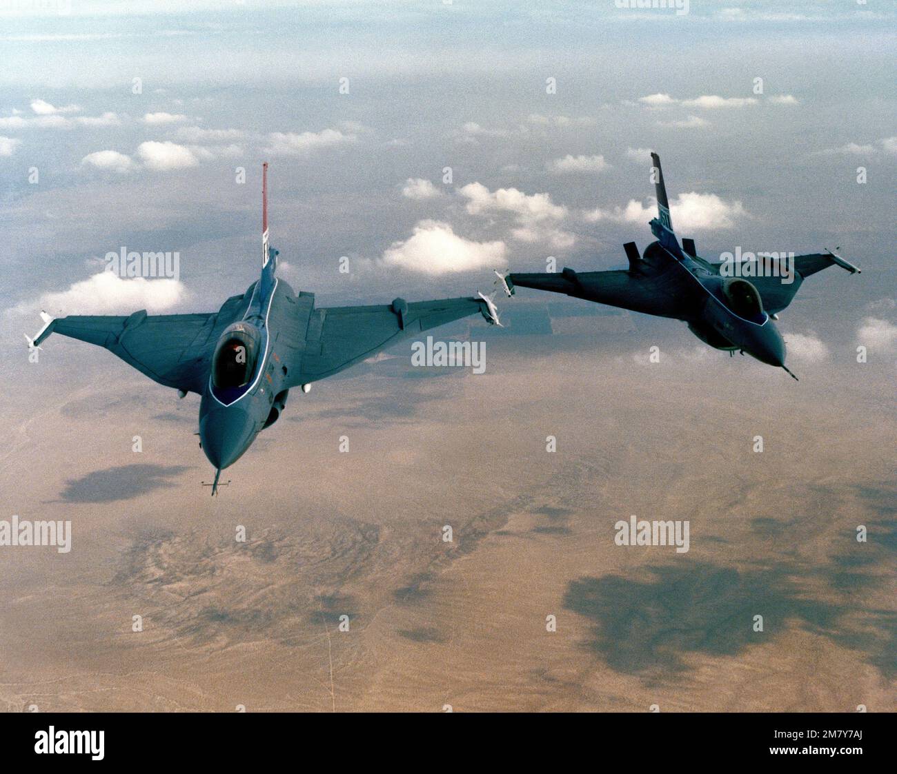 Two General Dynamics F16-XL combat fighter aircraft in flight. Country ...
