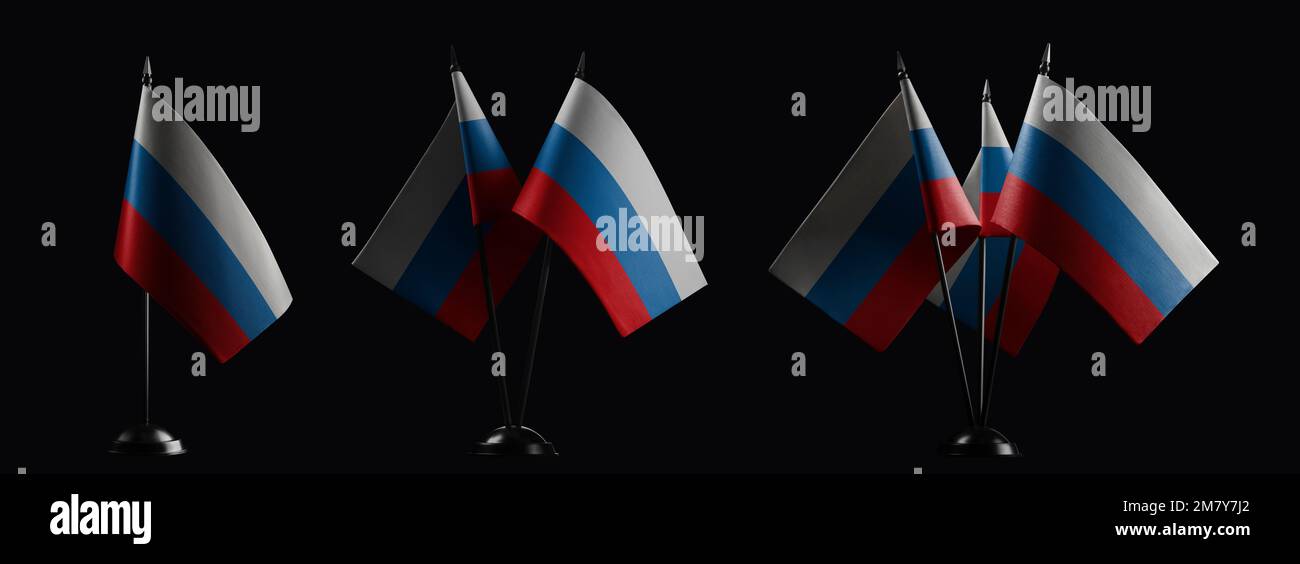 Small national flags of the Russia on a black background Stock Photo ...