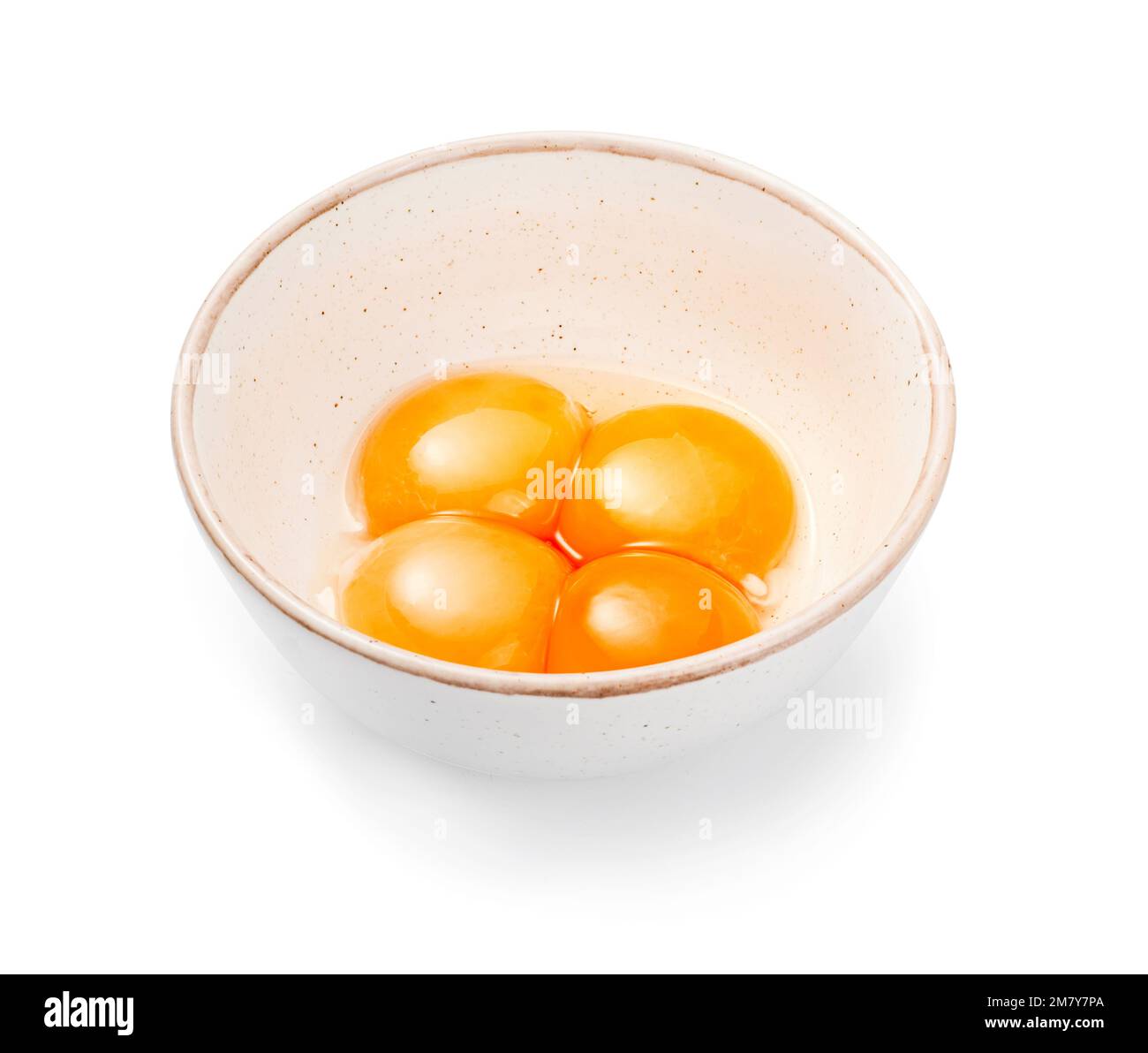 Bowl with egg yolks isolated. Three yolks in white bowl Stock Photo - Alamy
