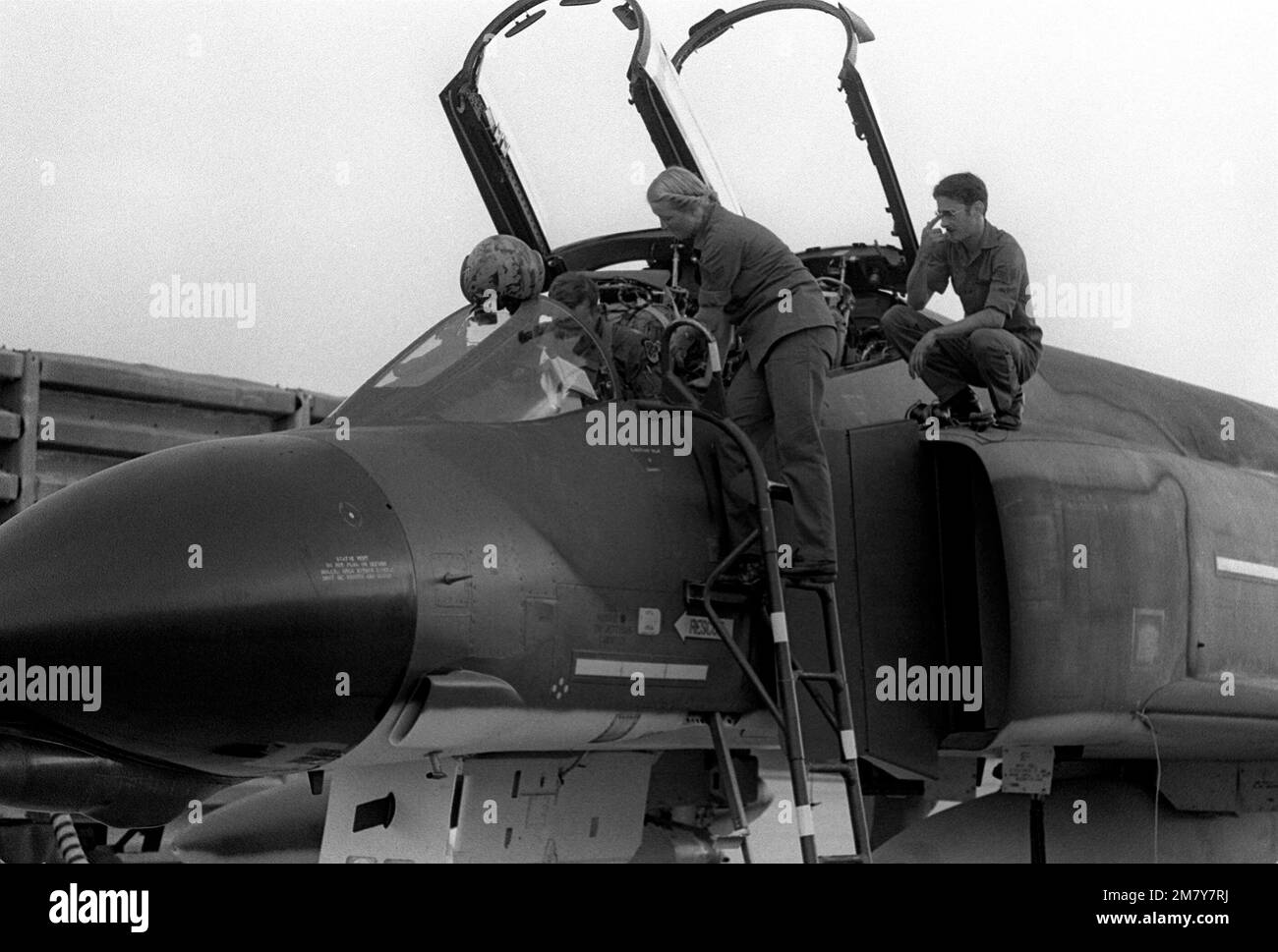 Crewmen board an F-4 Phantom II aircraft for their final flight from ...