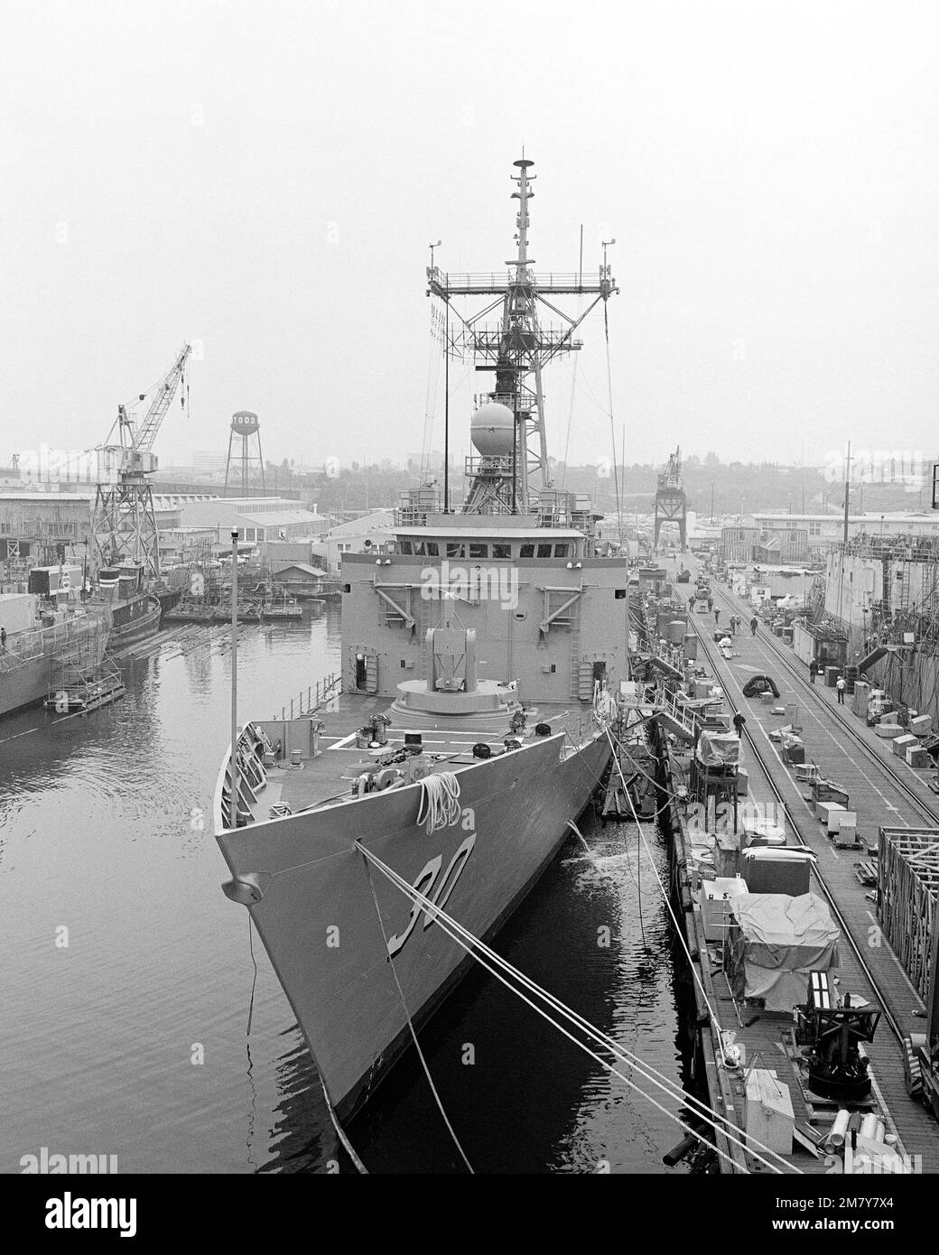 A port bow view of the guided missile frigate RIED (FFG 30) tied to the ...