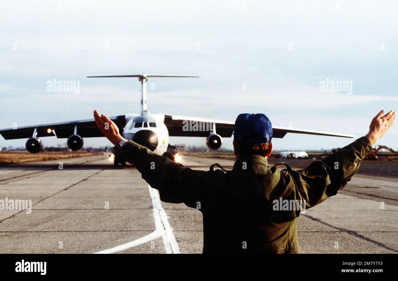 A C-141B Starlifter aircraft from the 437th Military Airlift Wing is ...