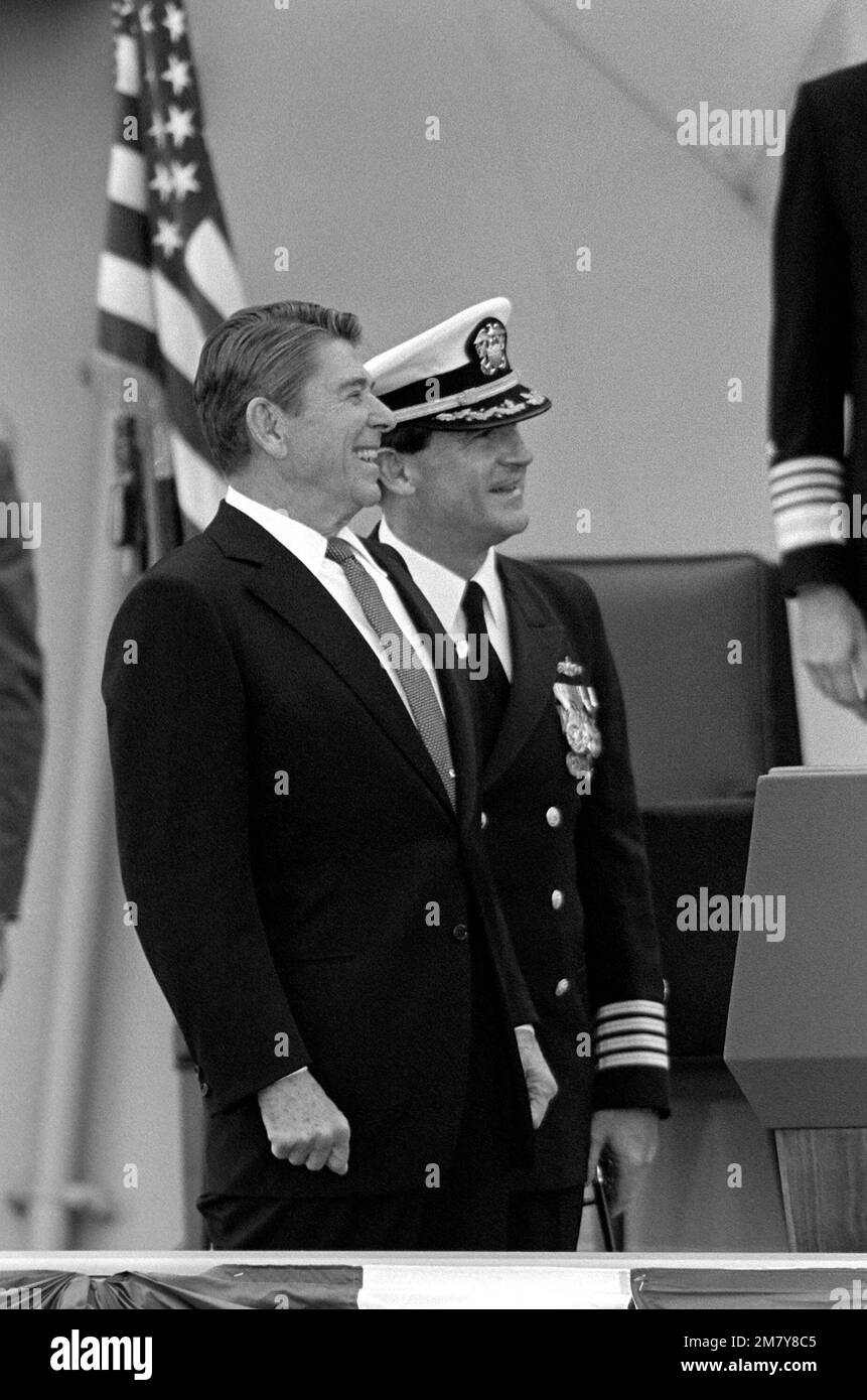 President Ronald Reagan stands with CPT William H. Fogarty, commanding ...