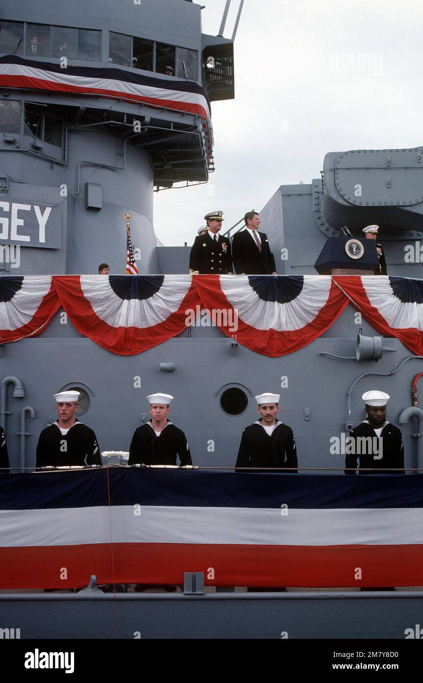 President Ronald Reagan, right, and CAPT William M. Fogarty, commanding ...