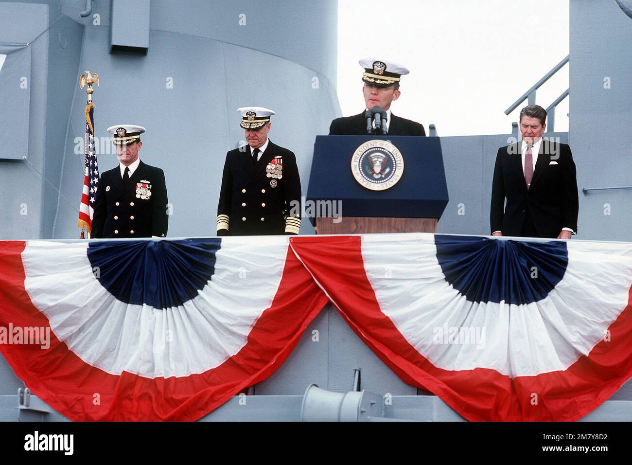Cmdr. Benny J. Hornsby, chaplain, gives the invocation during the ...