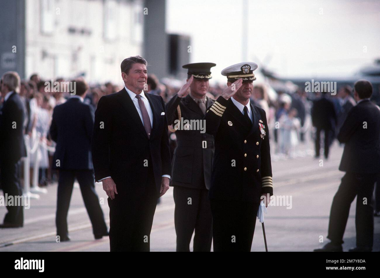 President Ronald Reagan and CAPT William M. Fogarty (right), commanding ...